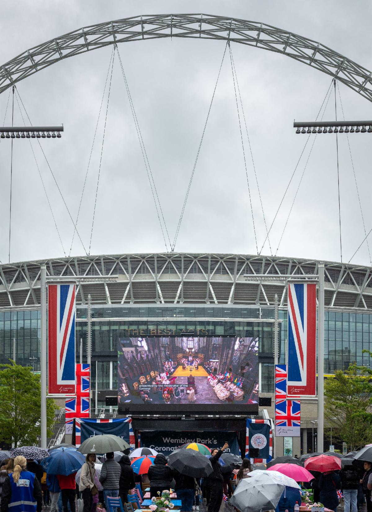 Wembley Park provides iconic backdrop as hundreds brave the rain to ...