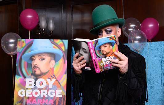 Boy George steps out in style to celebrate launch of his definitive ...